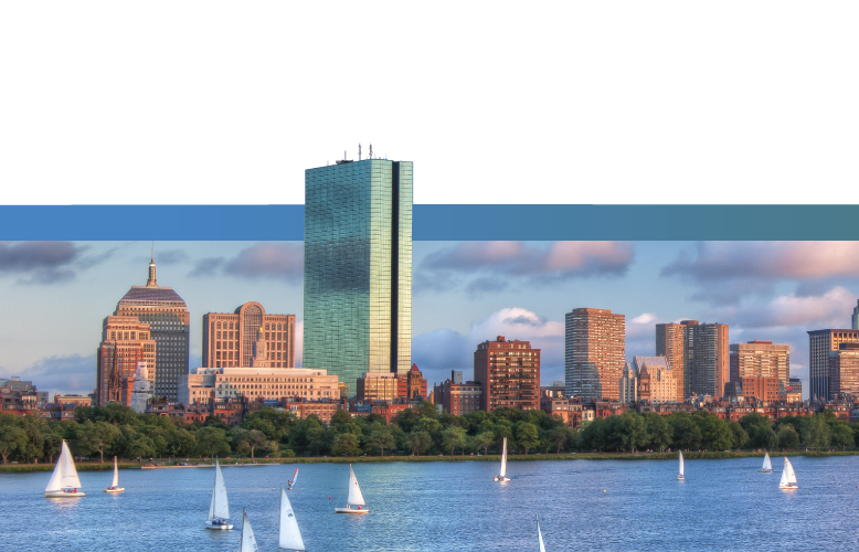 Skyline of Boston, taken from the Boston harbor in spring with sail ...